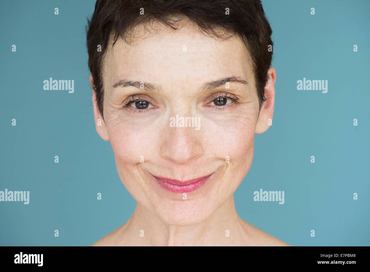 Portrait of smiling senior woman Stock Photo - Alamy