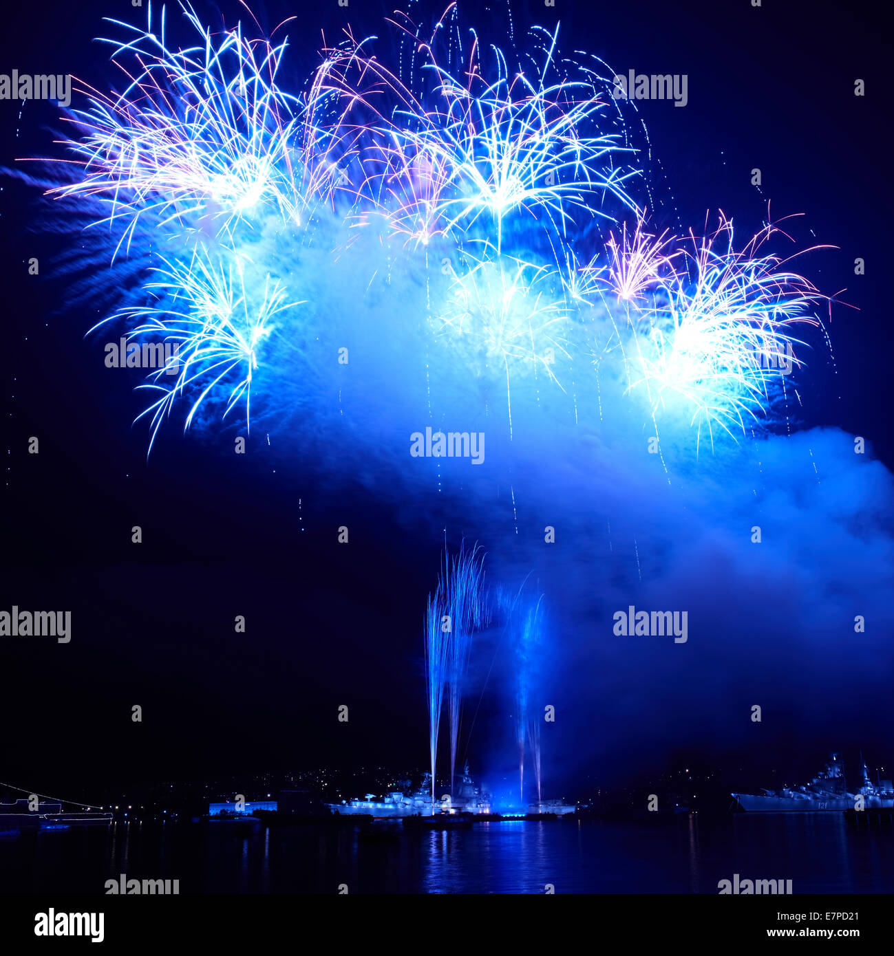 Blue colorful fireworks on the black sky background Stock Photo - Alamy