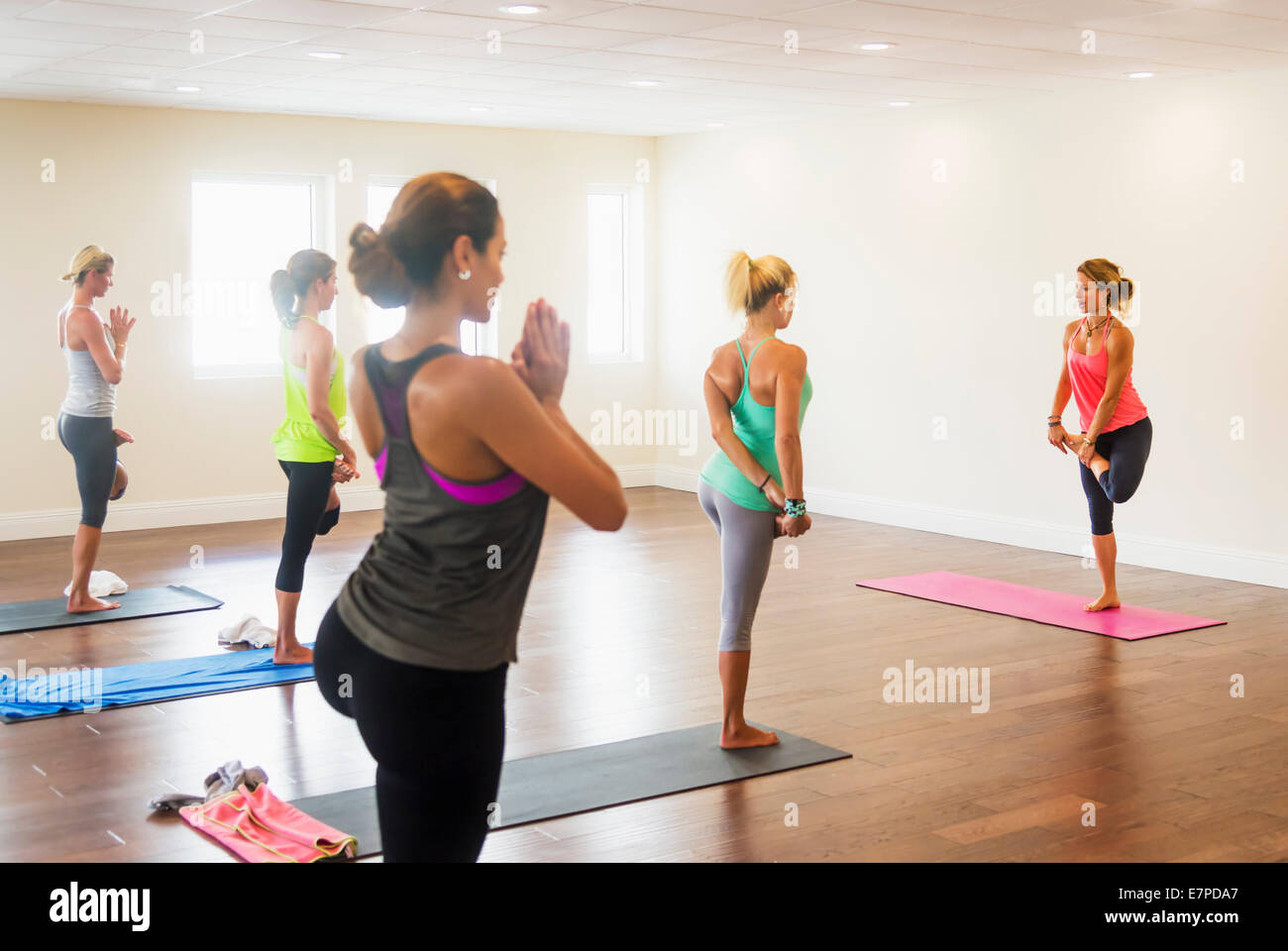 Women exercising yoga Stock Photo - Alamy