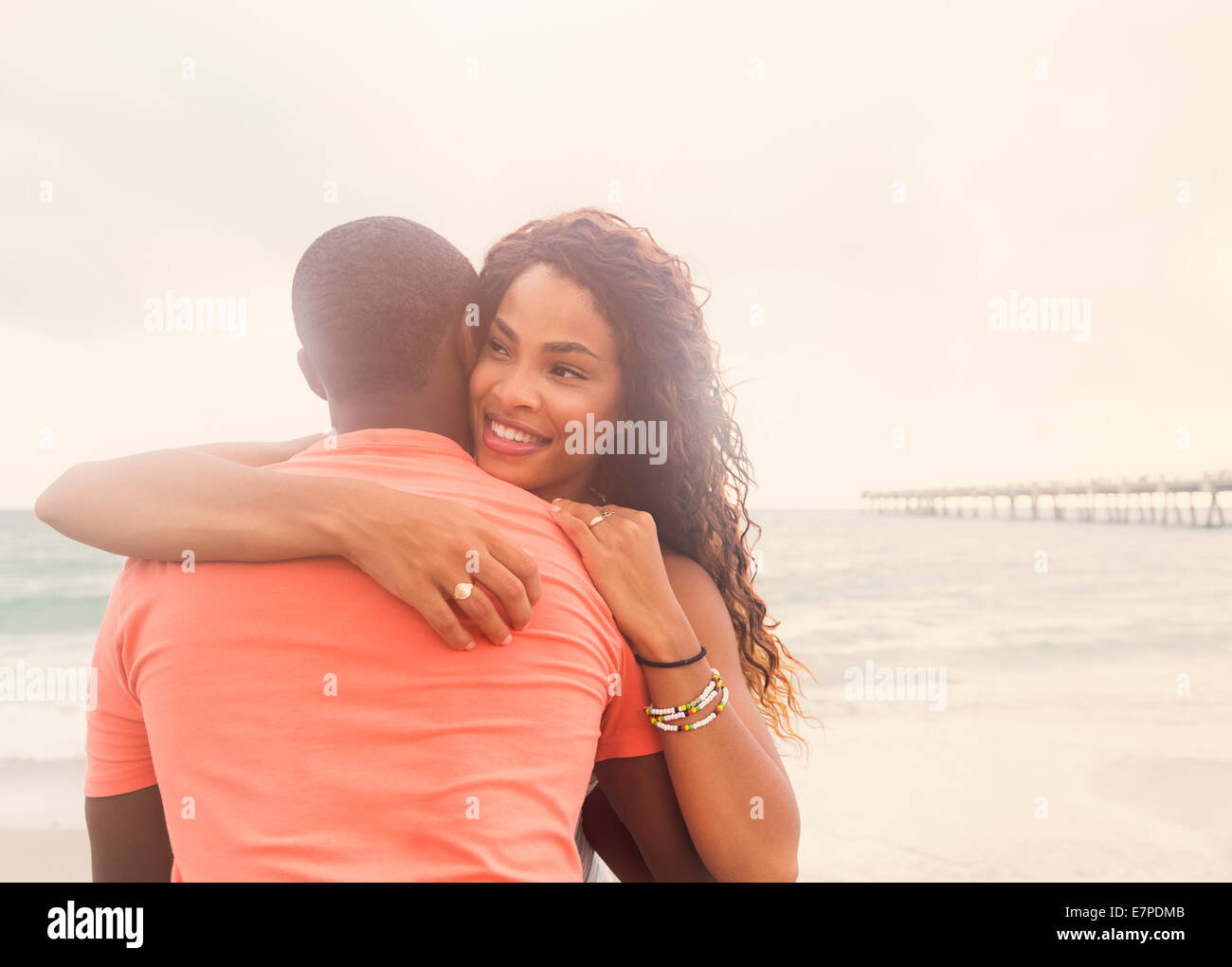 Young latin couple embrace hi-res stock photography and images - Alamy