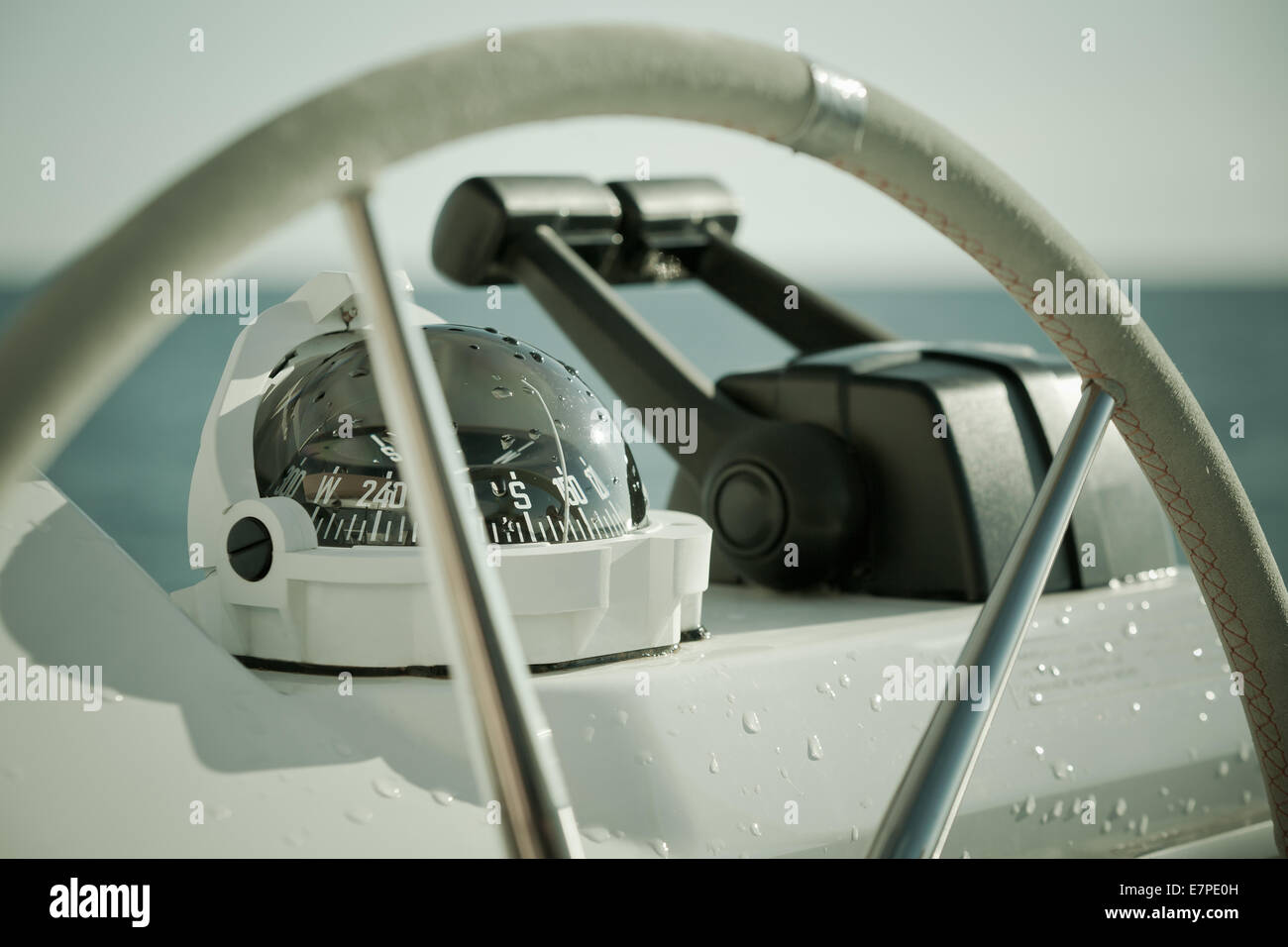 Sailing yacht control wheel and implement. Horizontal shot without ... Sailing yacht control wheel and implement. Horizontal shot without ...