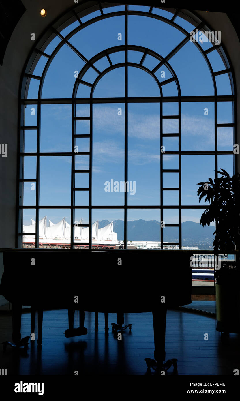 Canada Place pier seen through an arched window, Vancouver, British ...