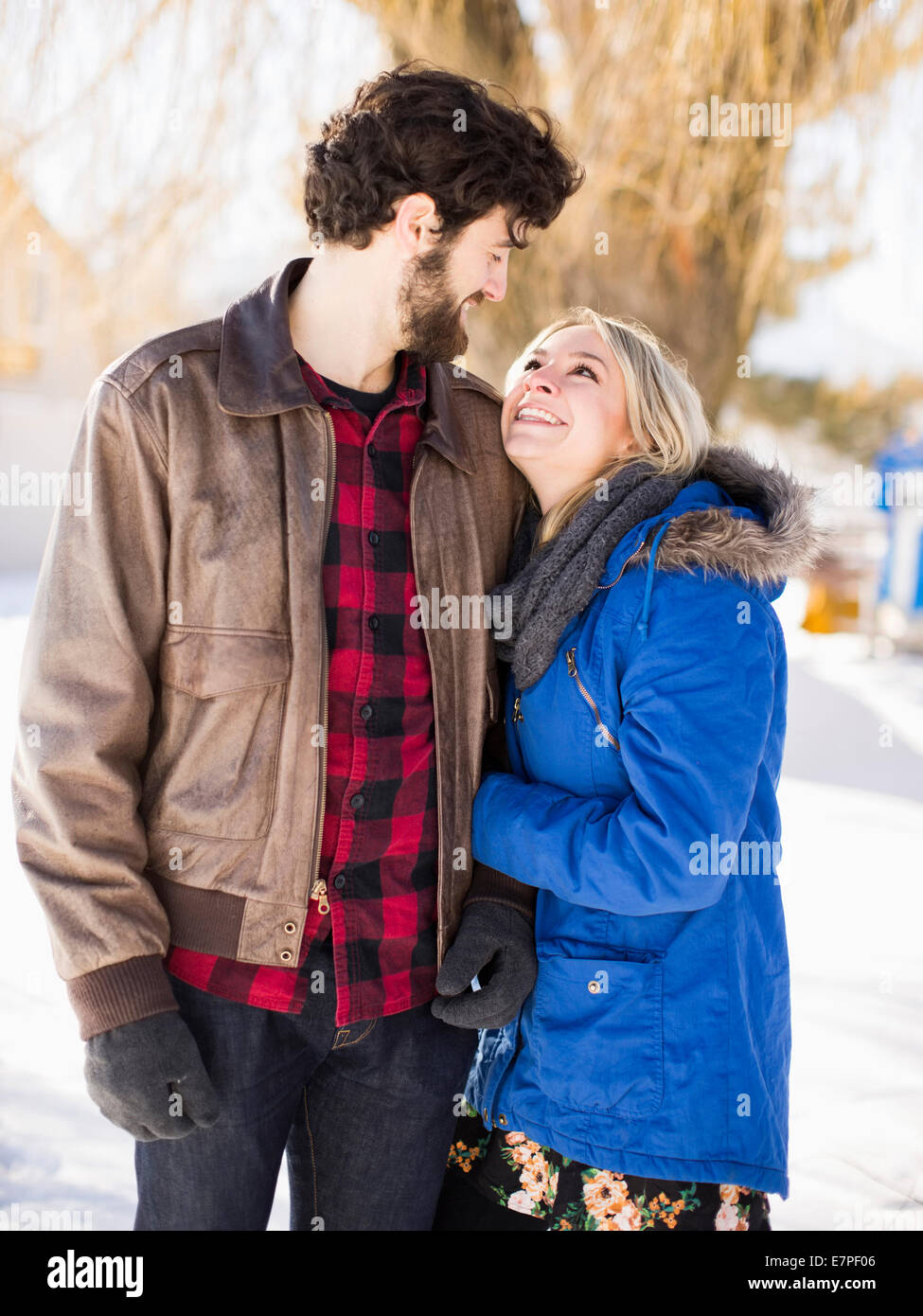 Couple smiles other embrace hi-res stock photography and images - Alamy