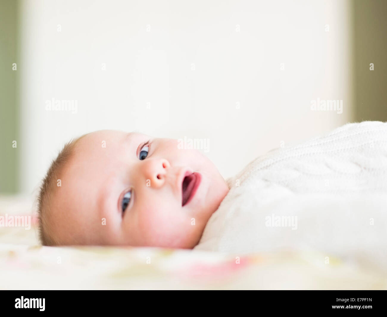 Baby looking down mouth open hi-res stock photography and images - Alamy