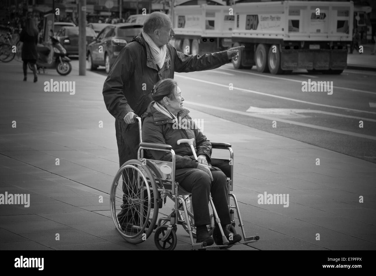 Old man pushing wheelchair hi-res stock photography and images - Alamy