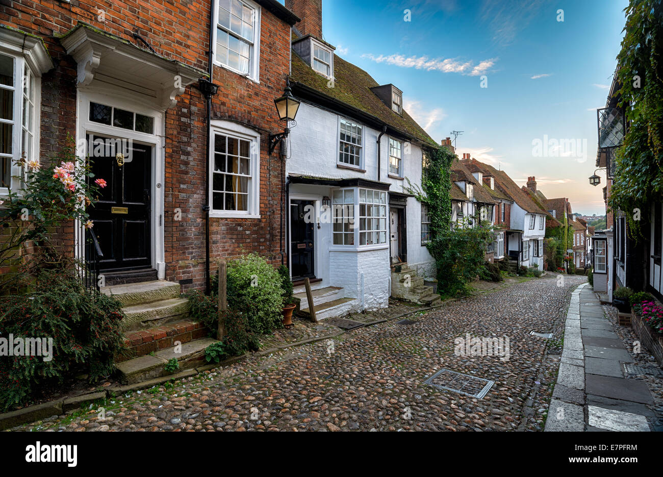 Picturesque cottages on a cobblestone street in the town of Rye in East ...