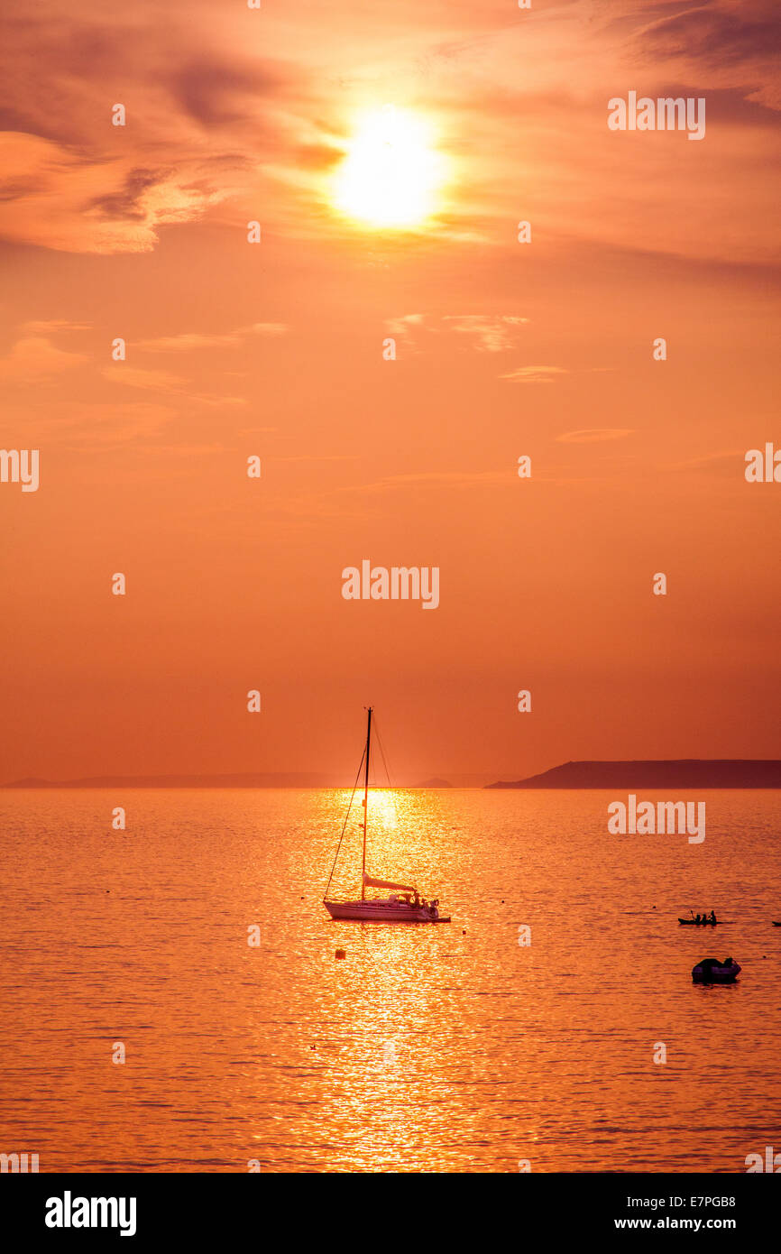 Sunset over the sea at Hope Cove, South Devon, Devon, England, United ...