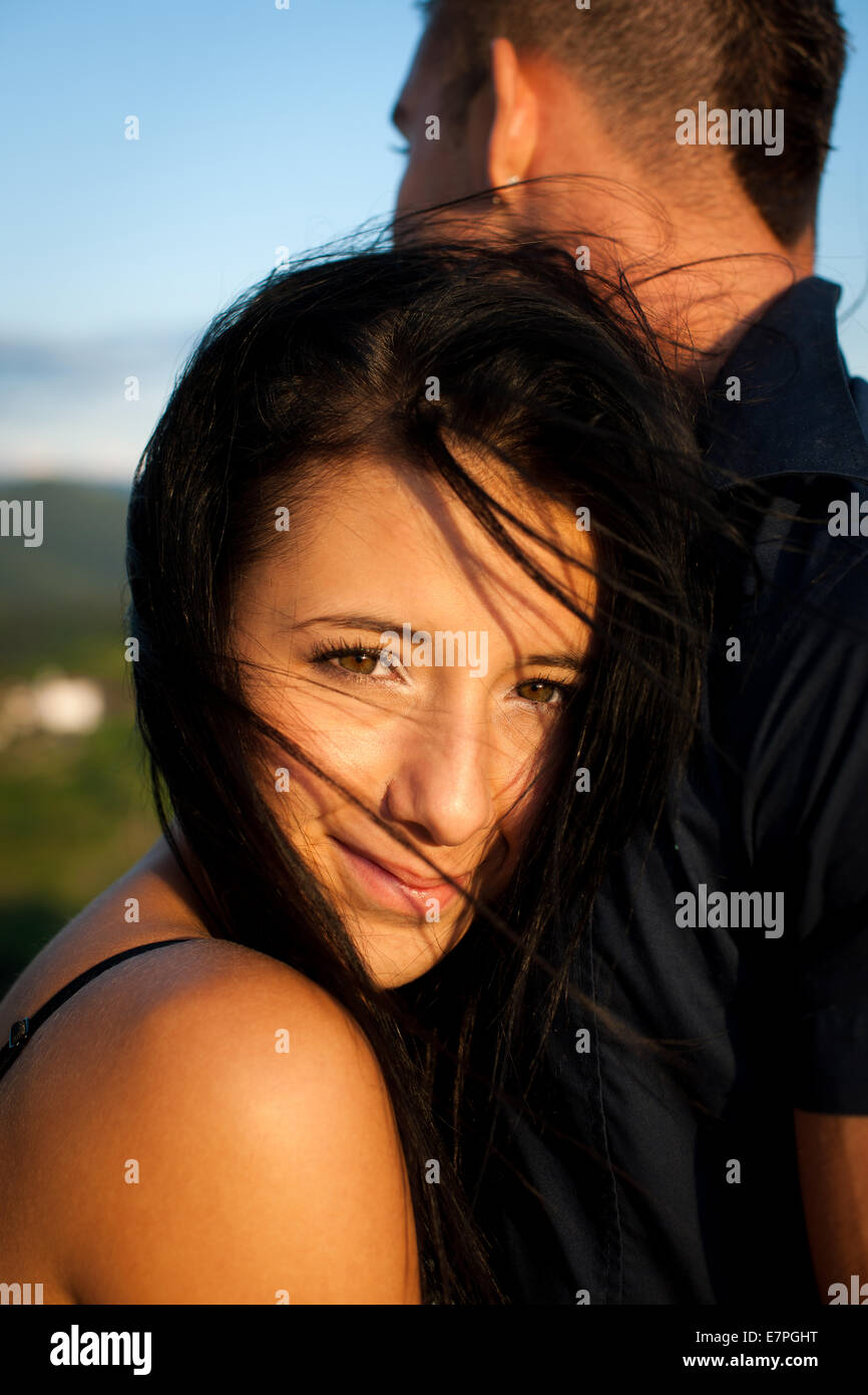 Teenage couple on a late summer afternoon in park Stock Photo - Alamy