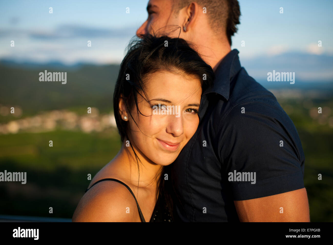 Teenage couple on a late summer afternoon in park Stock Photo - Alamy
