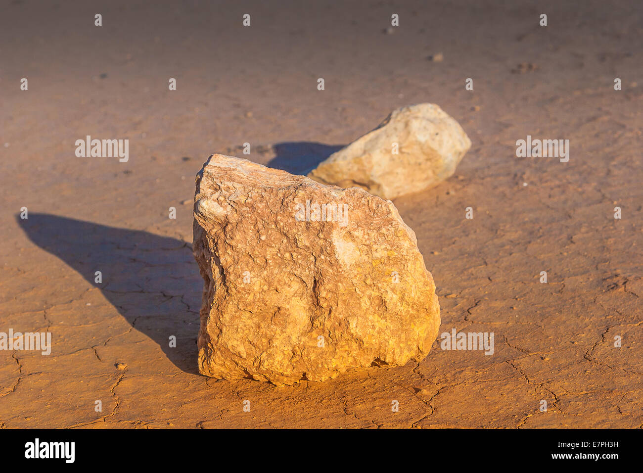 Cracked ground and rocks Stock Photo - Alamy