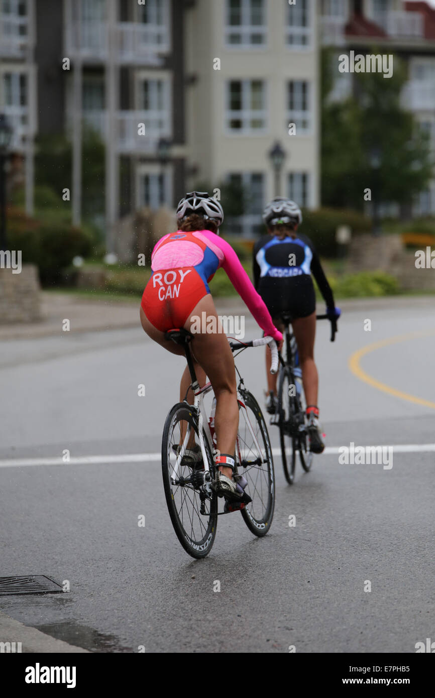 rear female cyclist tight suit Stock Photo - Alamy