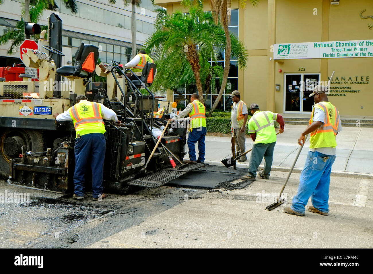 Asphalt paving of a street using heavy equipment Stock Photo - Alamy