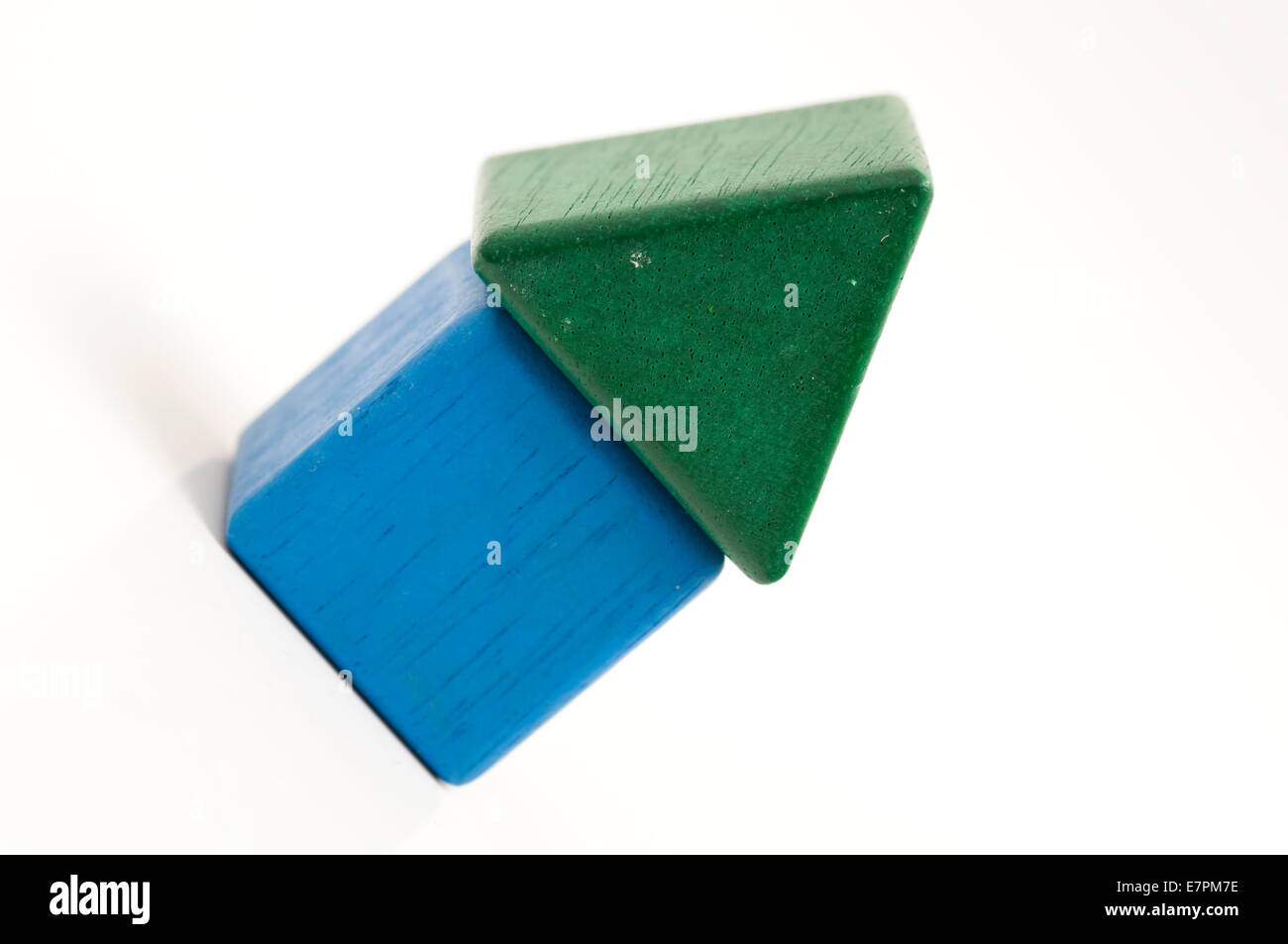 Wooden cube and the triangular prism together Stock Photo - Alamy