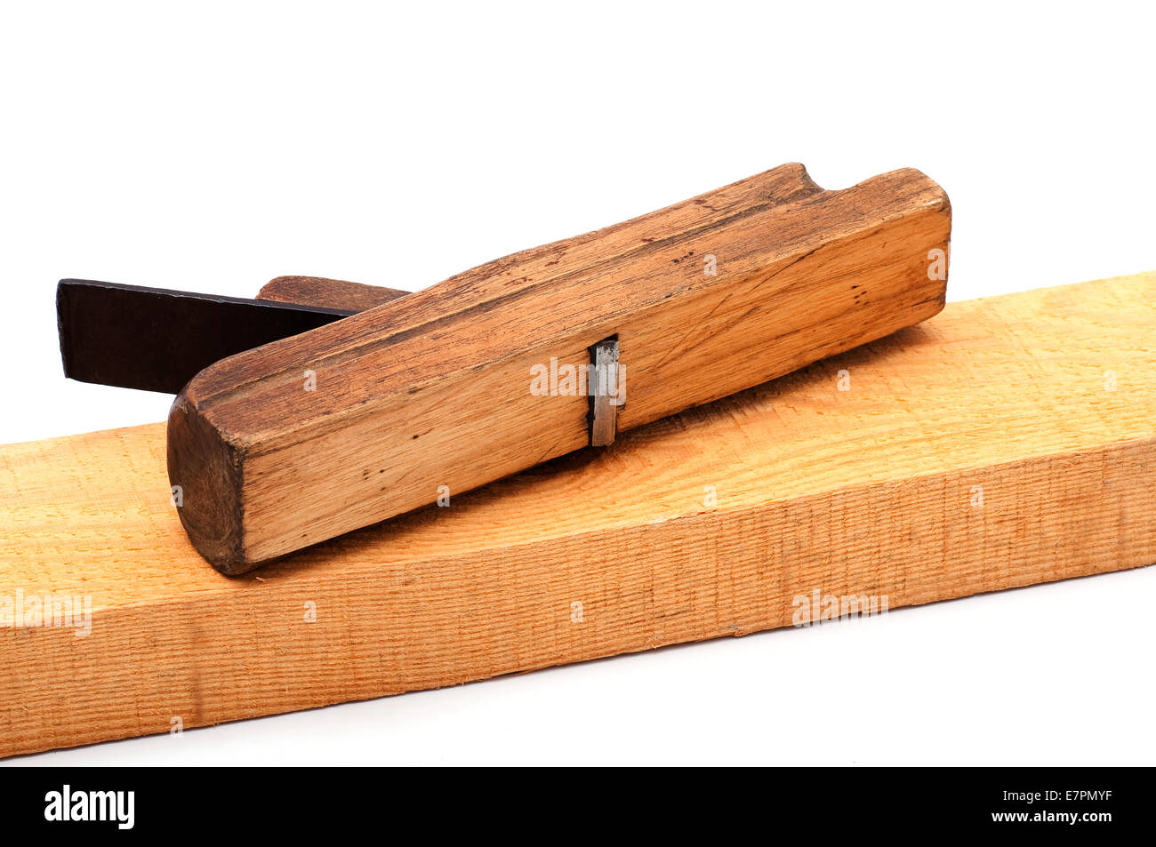 Carpenters plane on wood Stock Photo - Alamy