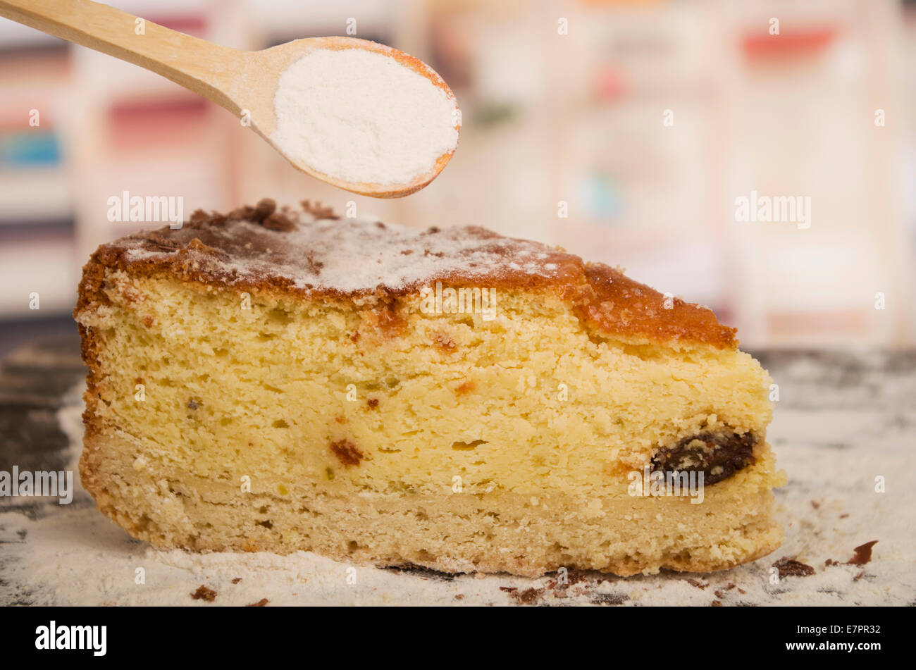 delicious piece of homemade vanilla cake decorated with caster sugar ...