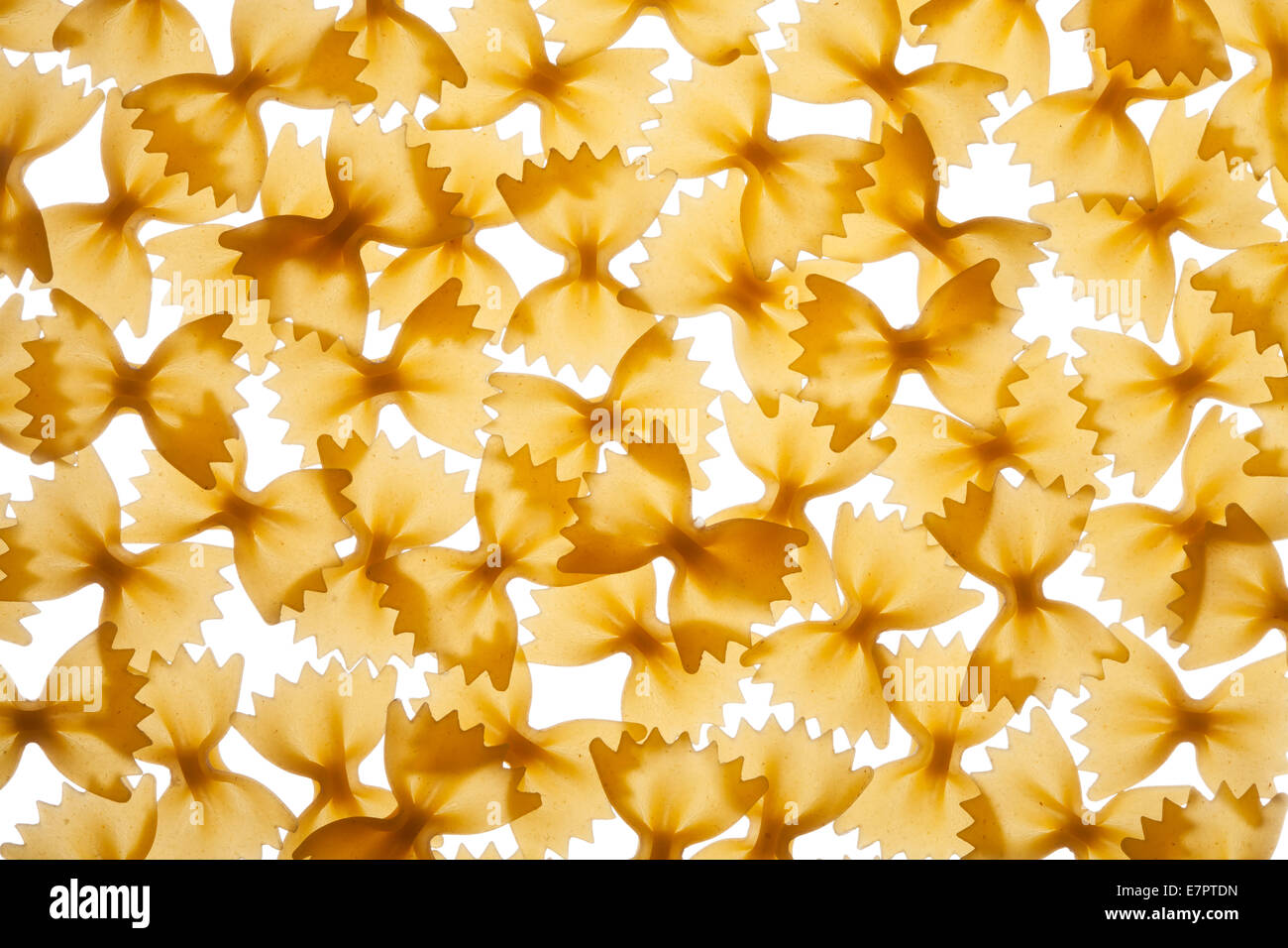 Italian raw pasta farfalle, bow tie, butterfly Stock Photo - Alamy