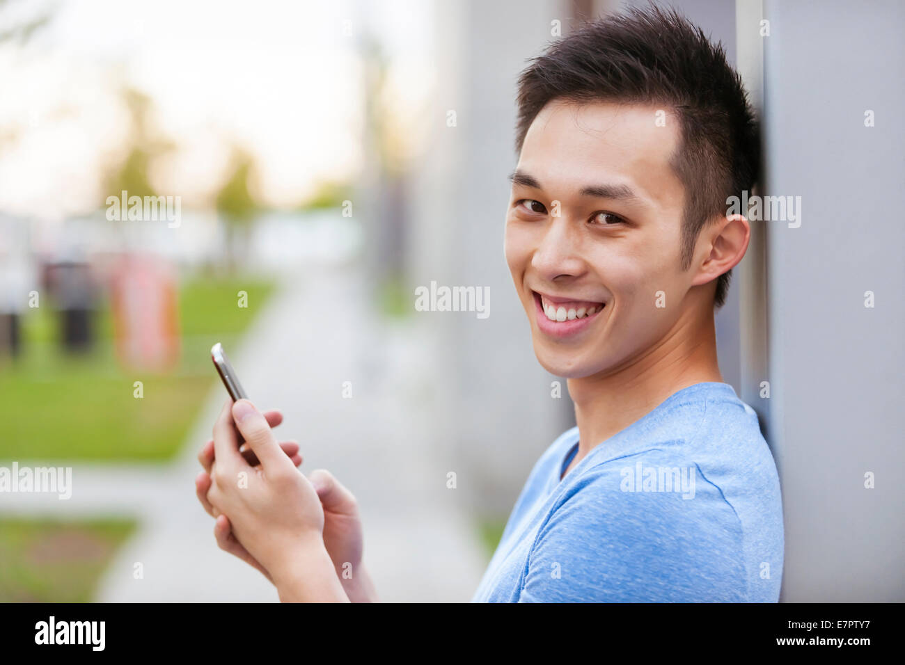 Asian man on phone hi-res stock photography and images - Alamy