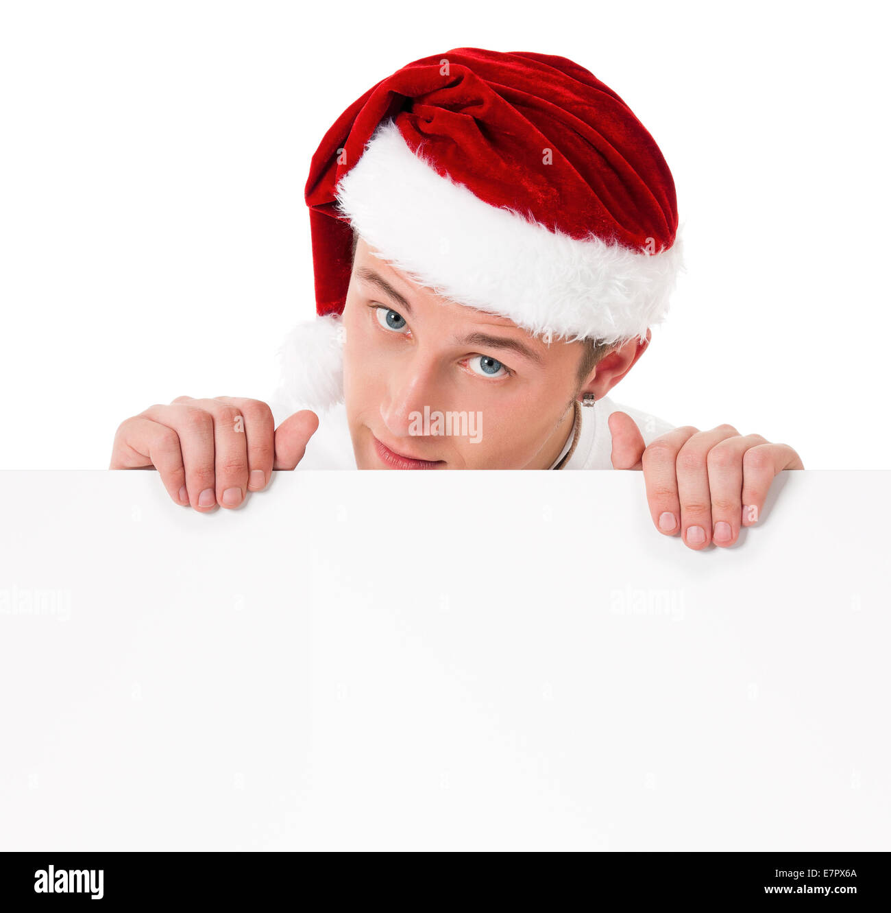 Young man in Santa hat Stock Photo - Alamy