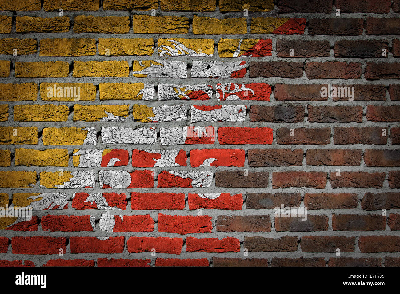 Dark brick wall texture - flag painted on wall - Bhutan Stock Photo - Alamy