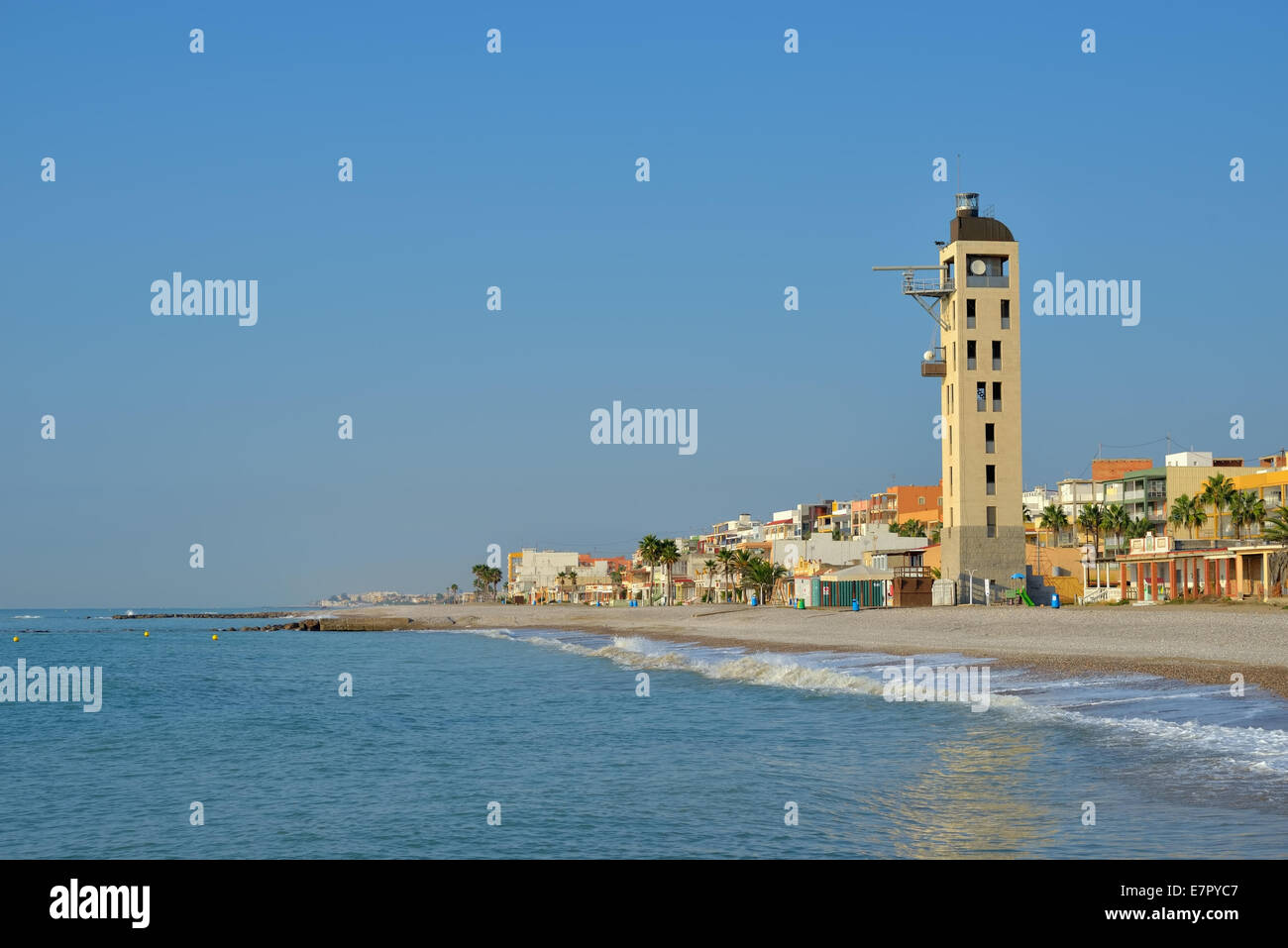 NULLES, SPAIN-SEPTEMBER 06, 2013: Beach and a lighthouse in Nulles area ...