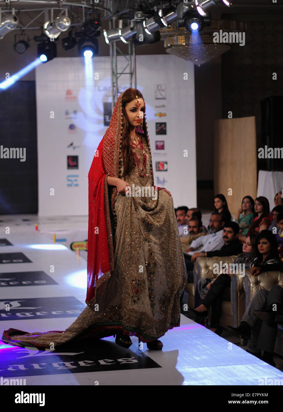 Lahore, Pakistan. 21st Sep, 2014. Pakistani model walks on the ramp to ...
