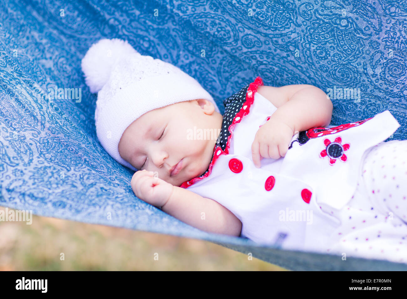 Cute little baby sleeping in the park outdoor on the grass Stock Photo ...