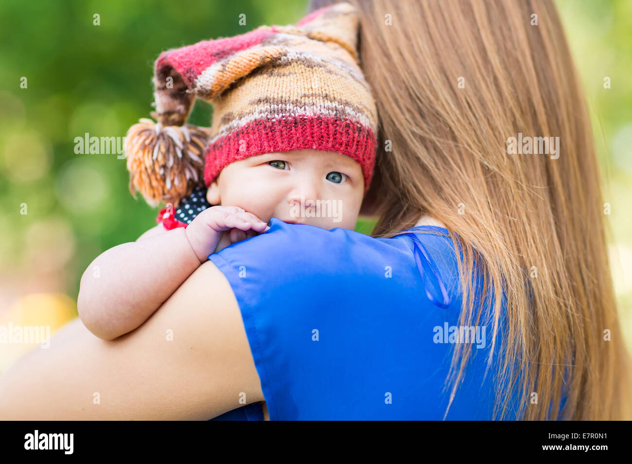 Beautiful Mother And Baby outdoors. Nature. Beauty Mum and her Child ...