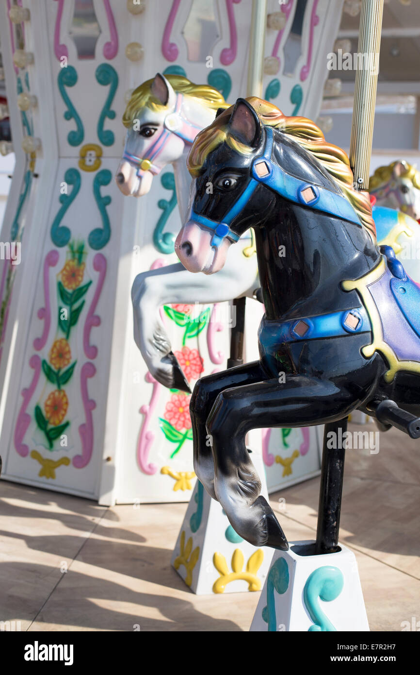 Carousel in an Amusement Park Vertical Stock Photo - Alamy