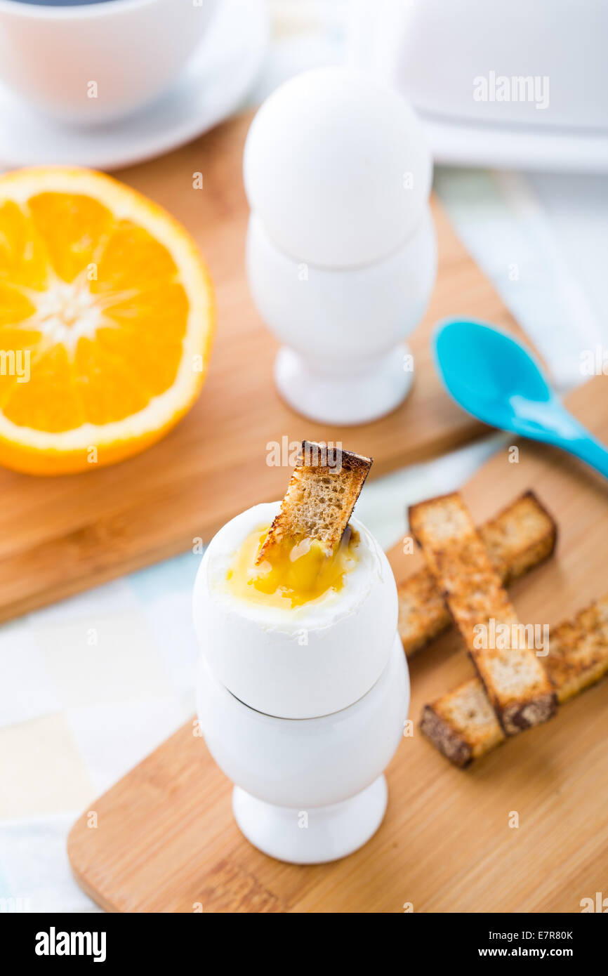 Breakfast with soft boiled eggs and toast soldiers Stock Photo - Alamy