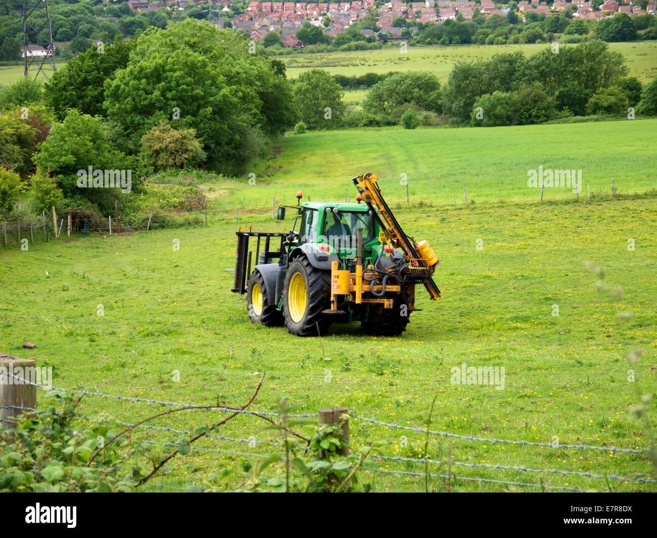 Farmer driving a tractor hi-res stock photography and images - Alamy