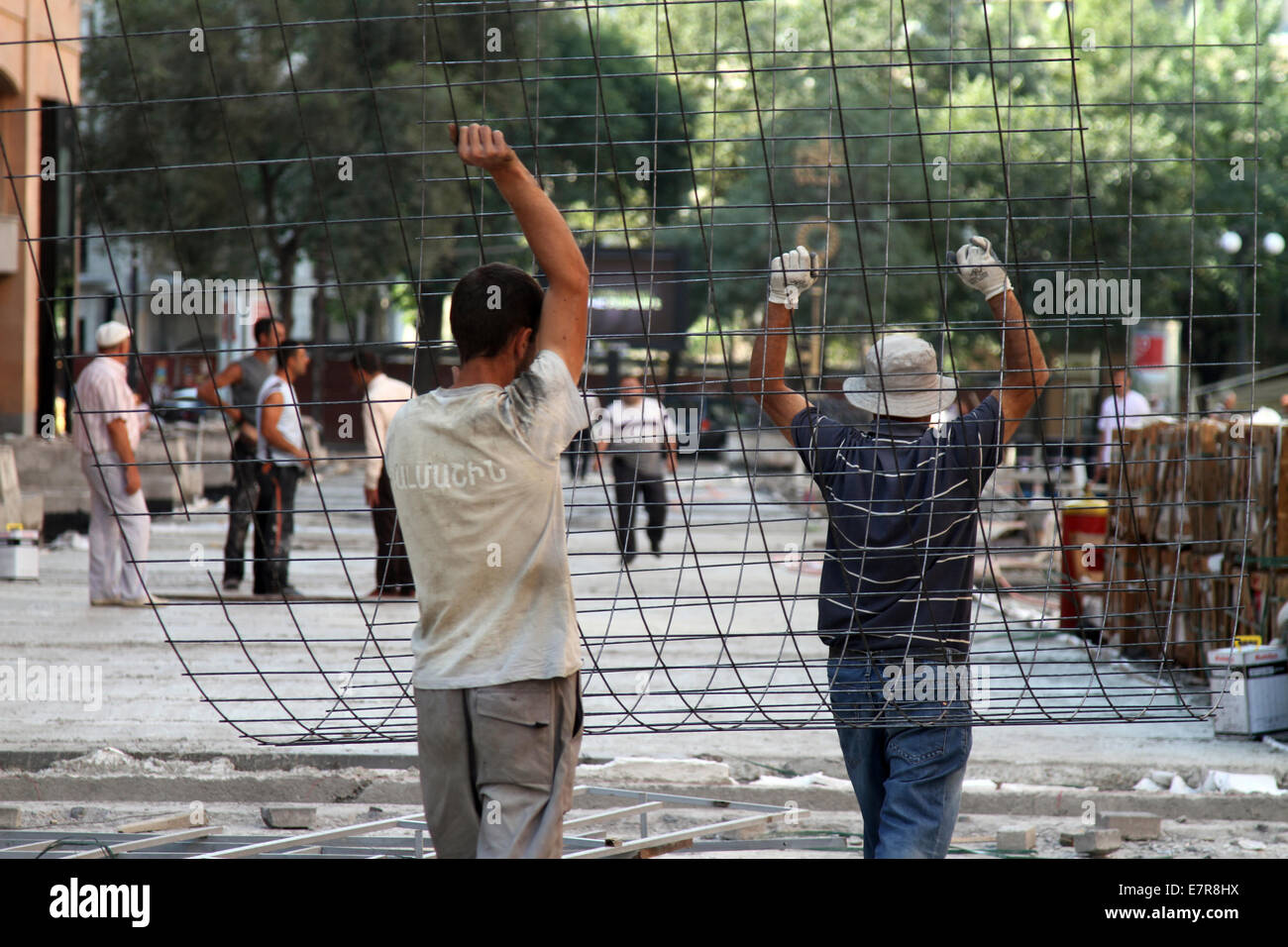 Workers on a building site on Northern Avenue in central Yerevan ...