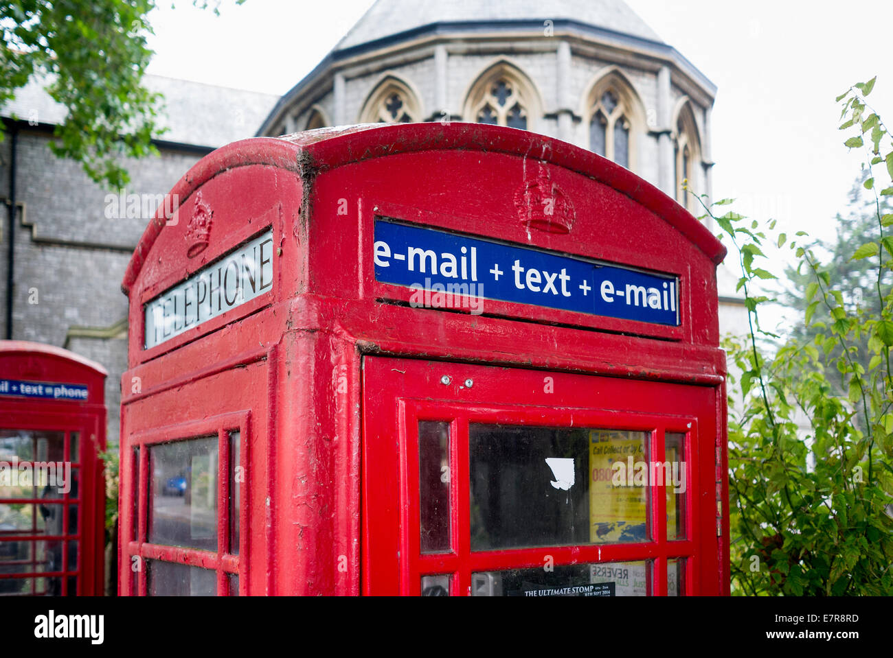 Classic red post office telephone box showing modern services including ...