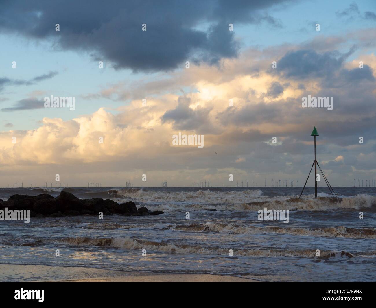 Wave ocean beach rocks windfarm hi-res stock photography and images - Alamy