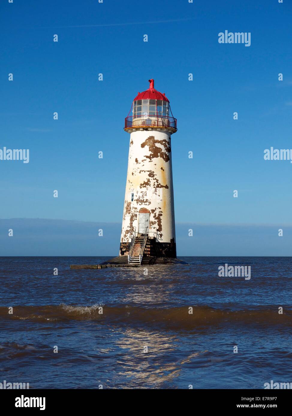 Abandon lighthouse in the sea Stock Photo - Alamy