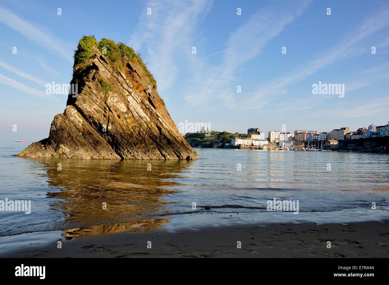 Goskar Rock, Tenby, Wales, under a fabulous jet stream streaked blue ...