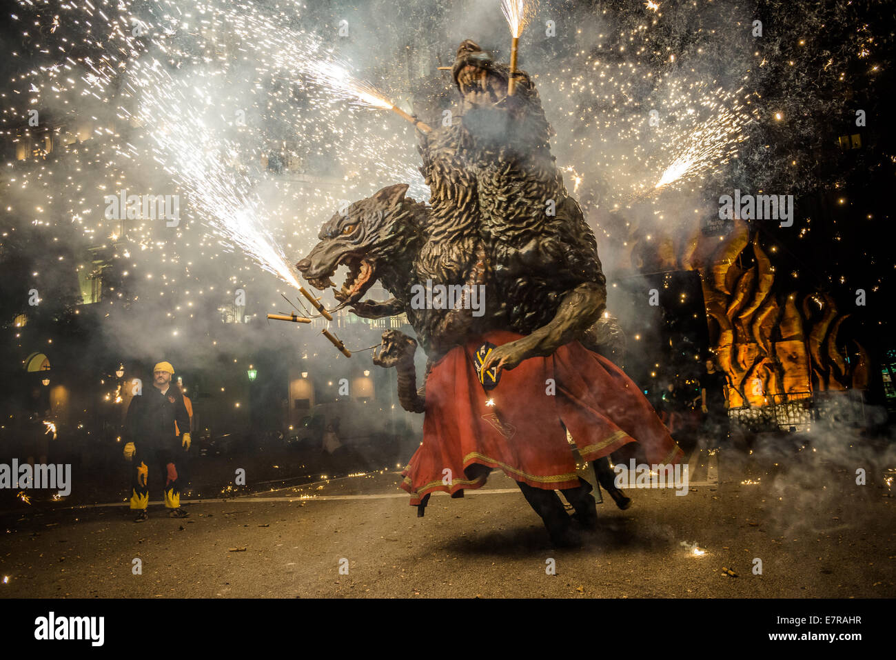 Barcelona, Spain. 21st Sep, 2014. A fire beast sets off his fire ...