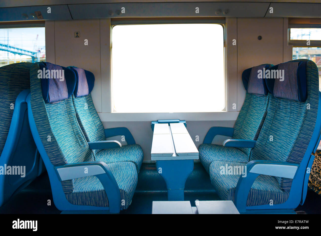 2 class seats in the modern european train with white isolated window ...