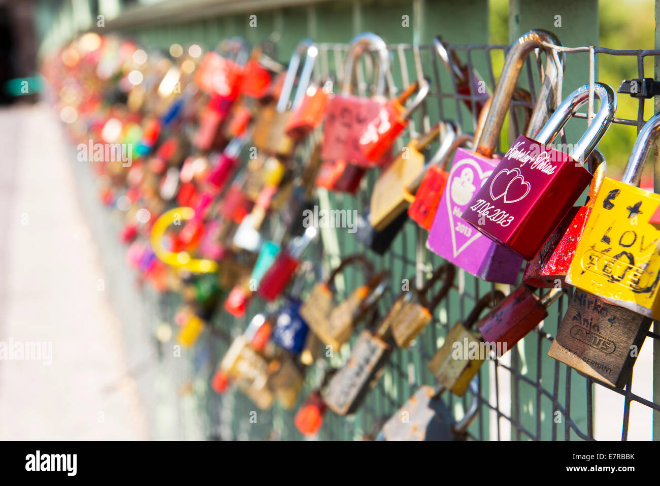 Locks attached by couples onto the pedestrian bridge at Landungsbrucke ...