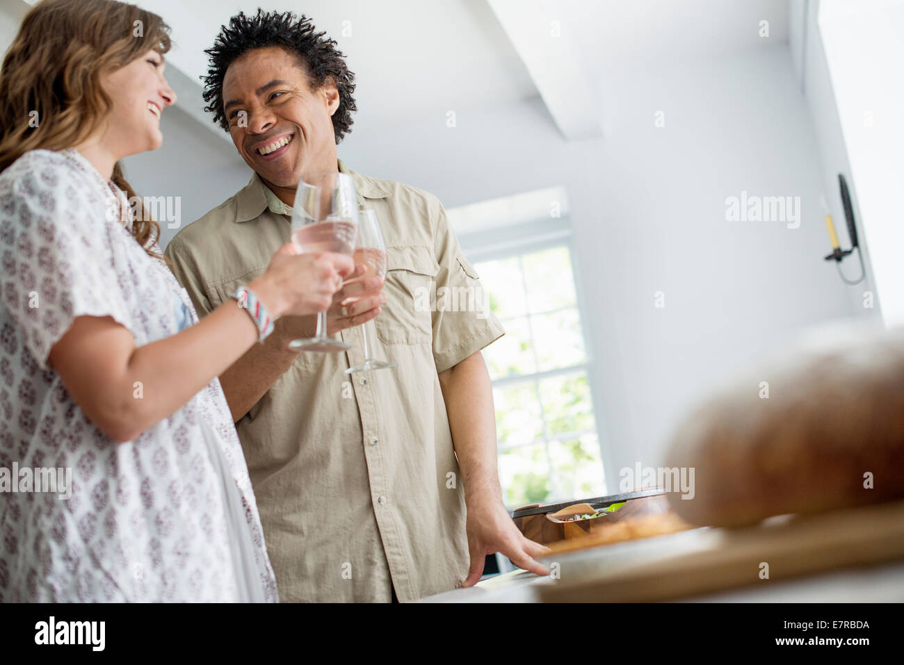 People carrying fresh food to a family table Stock Photo - Alamy
