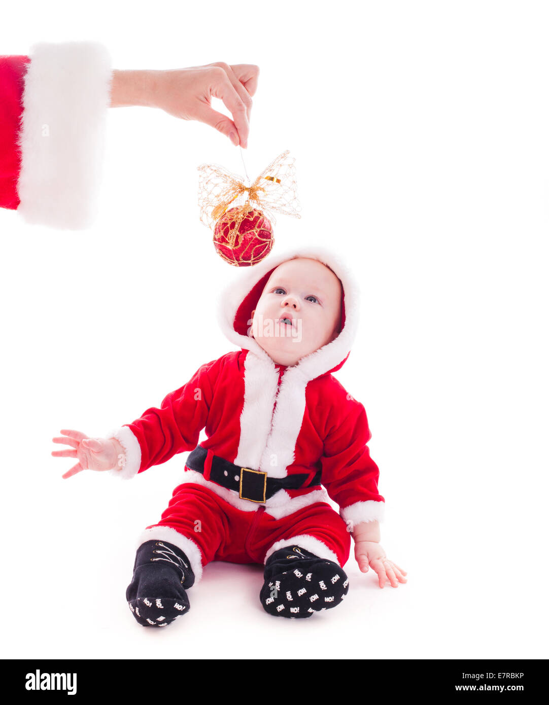 Little Santa boy wants to play isolated on white background Stock Photo ...