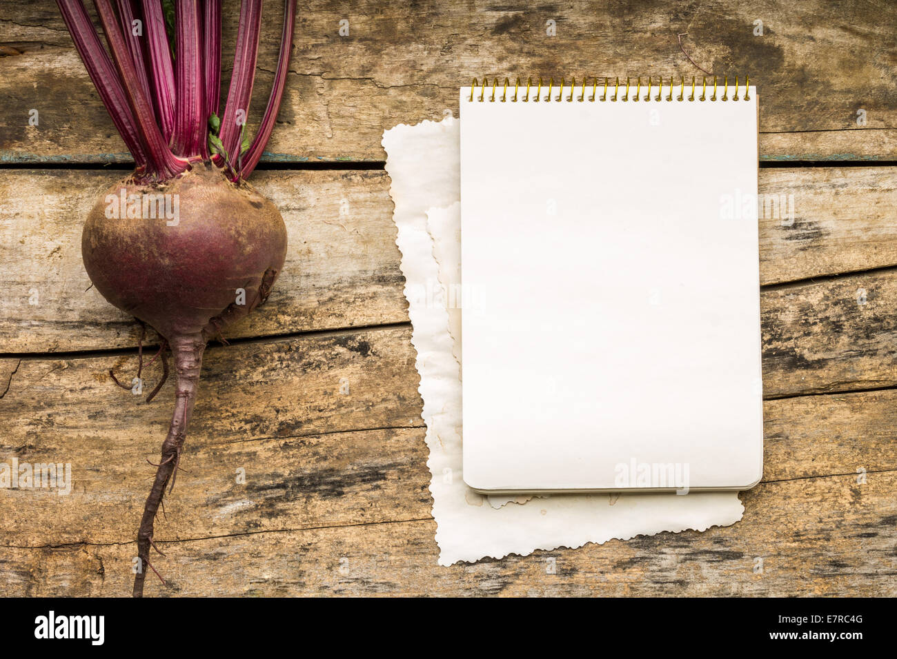 Menu background. Vegetables on table with cook book. Cooking with ...