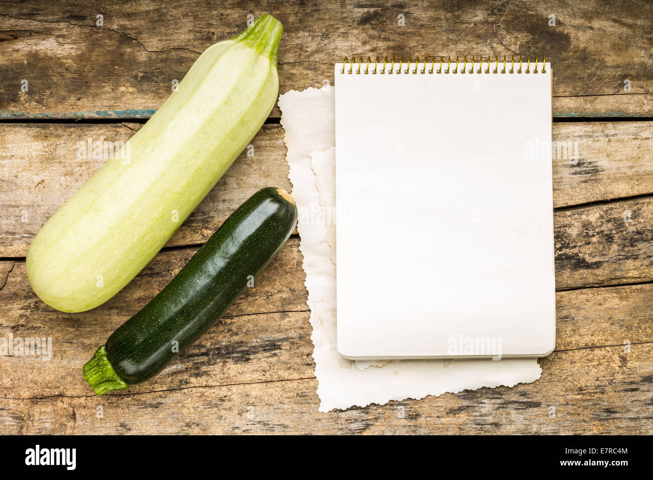 Menu background. Vegetables on table with cook book. Cooking with ...