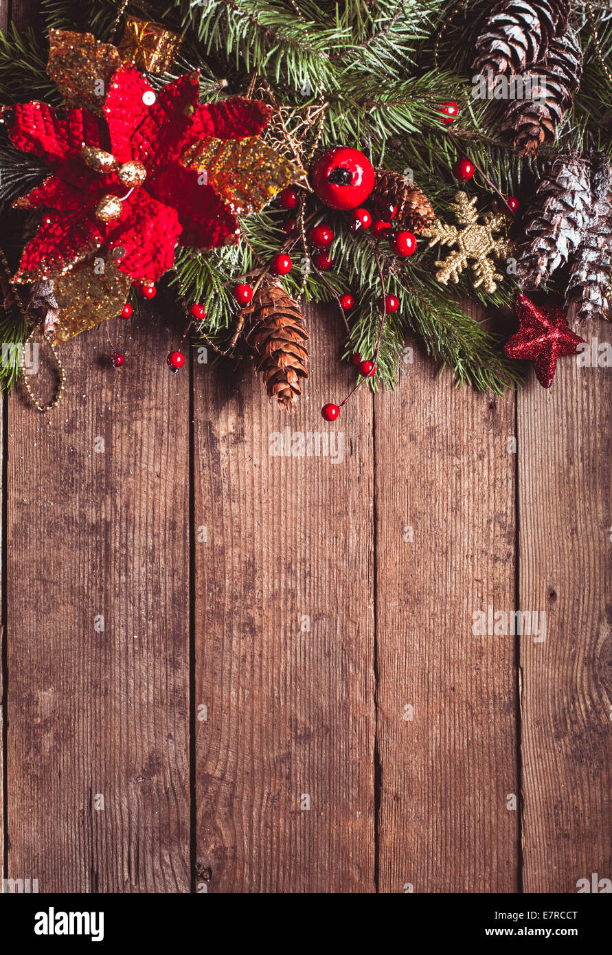 Christmas border design on the wooden background Stock Photo - Alamy