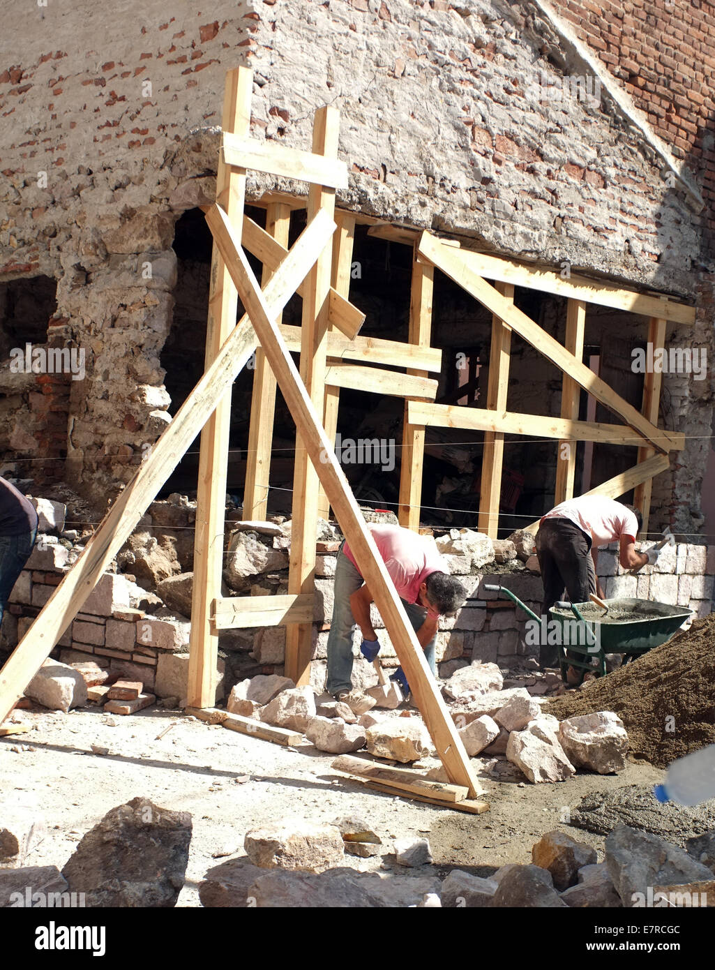 Workers working in a construction side Stock Photo - Alamy