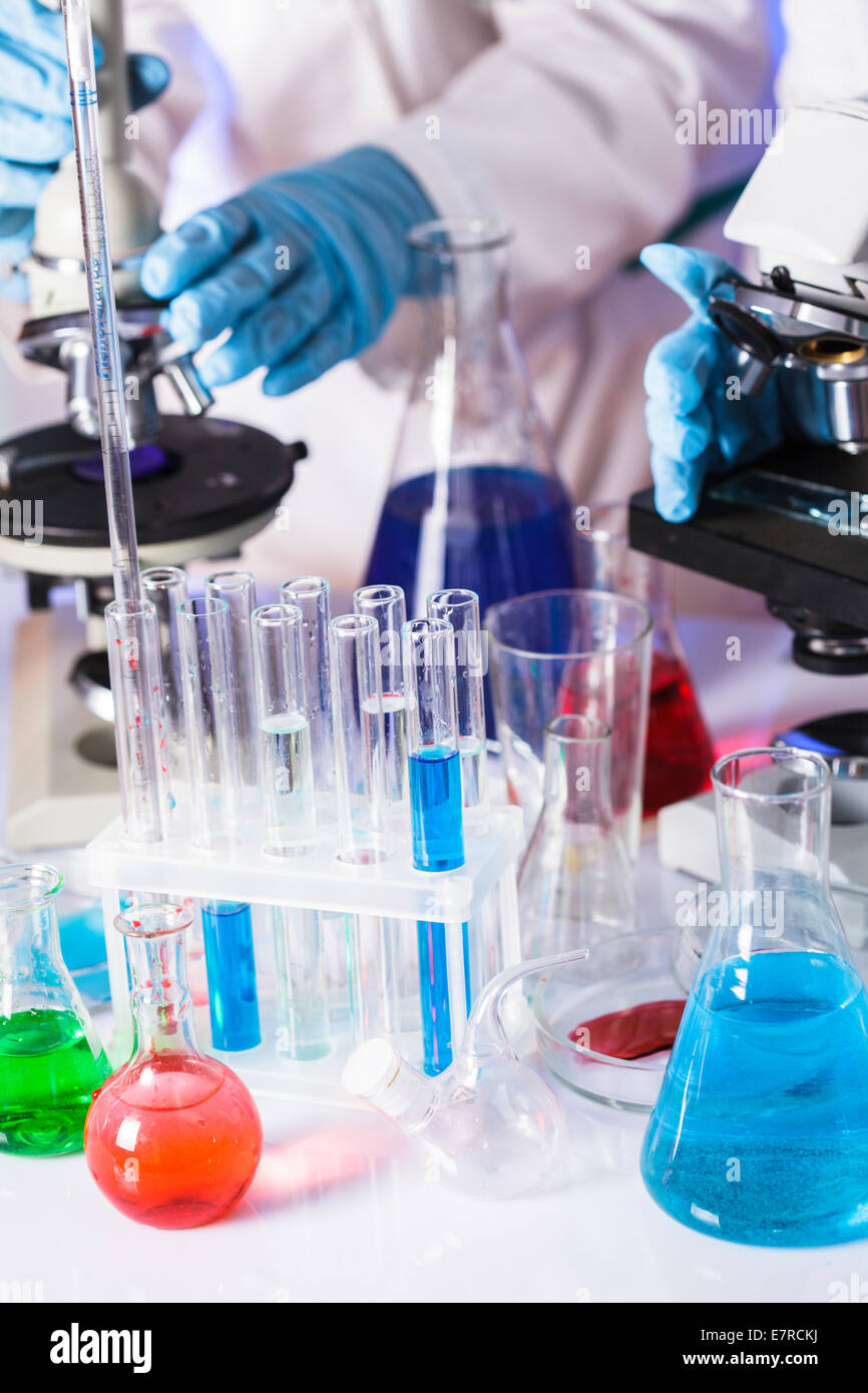 Two scientists in the chemical laboratory are doing experiments Stock ...