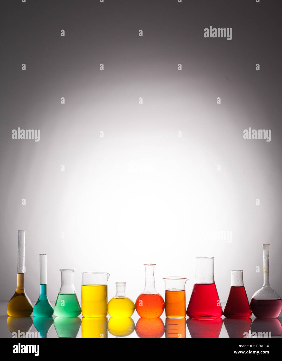 Laboratory glass with rainbow color liquids, chemistry still life Stock ...