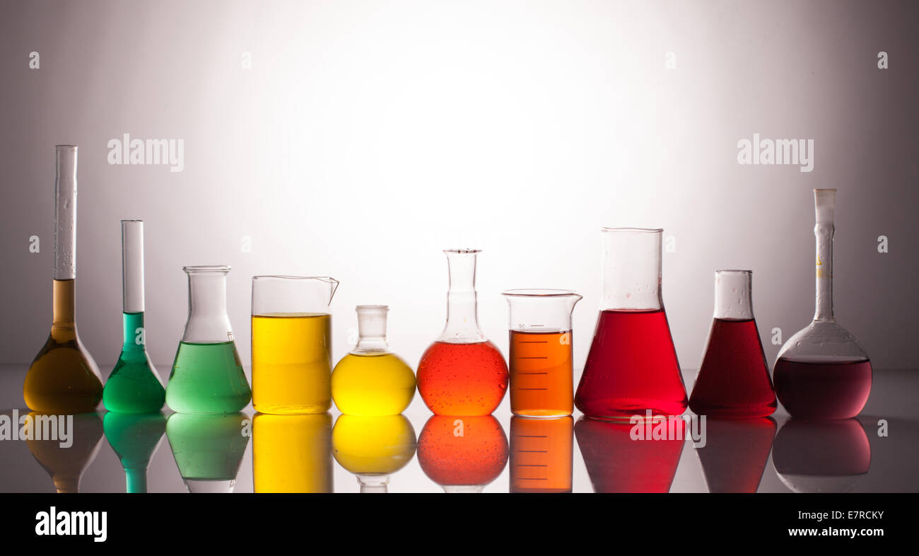 Laboratory glass with rainbow color liquids, chemistry still life Stock ...