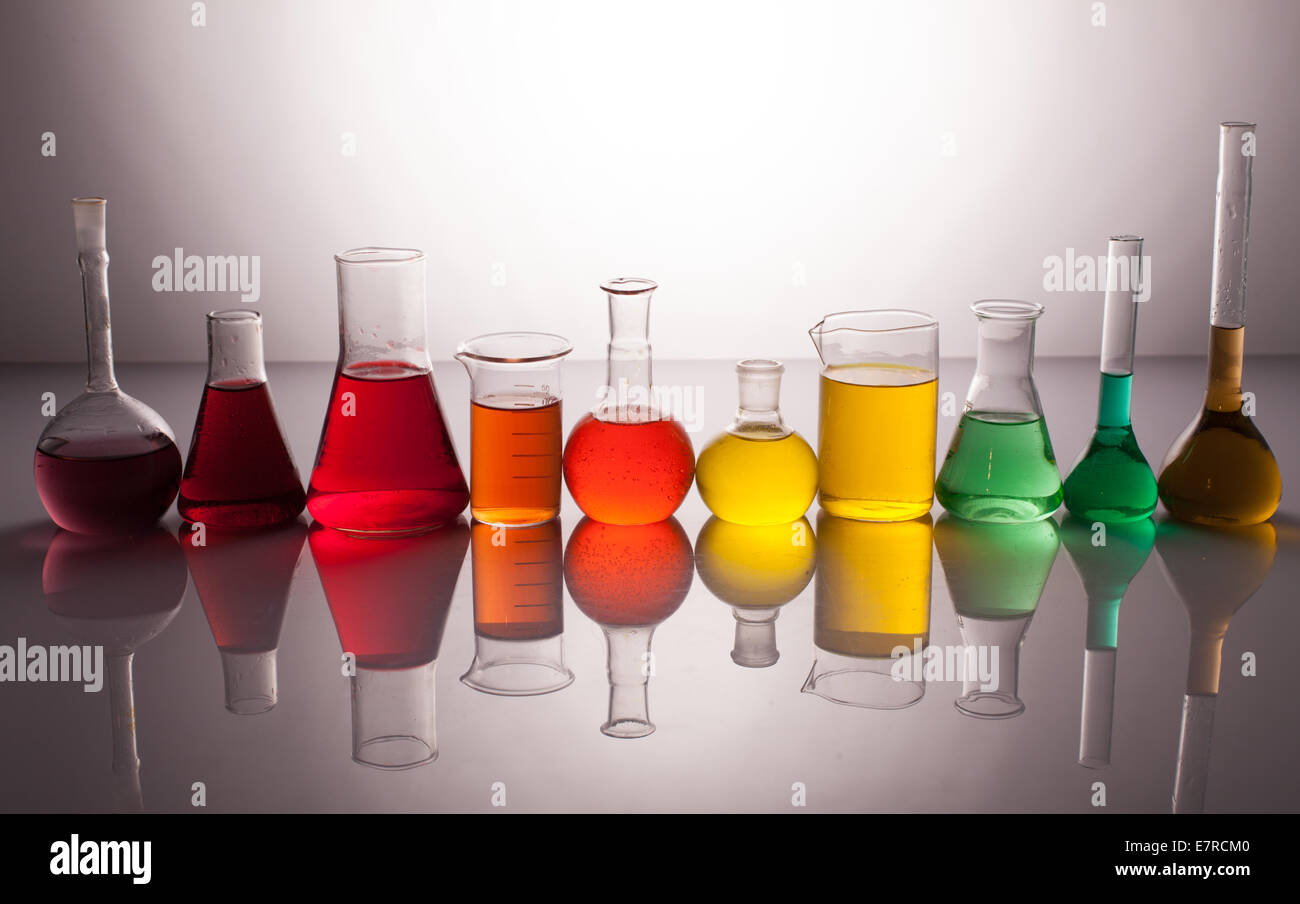 Laboratory glass with rainbow color liquids, chemistry still life Stock ...
