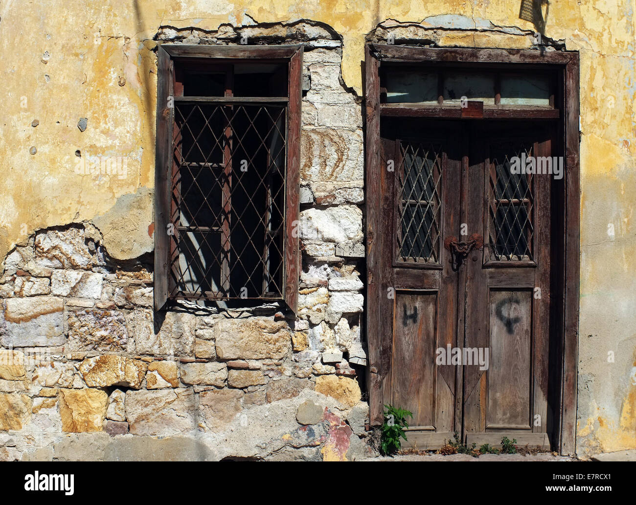 Old wooden vintage door and window in ruin Stock Photo - Alamy