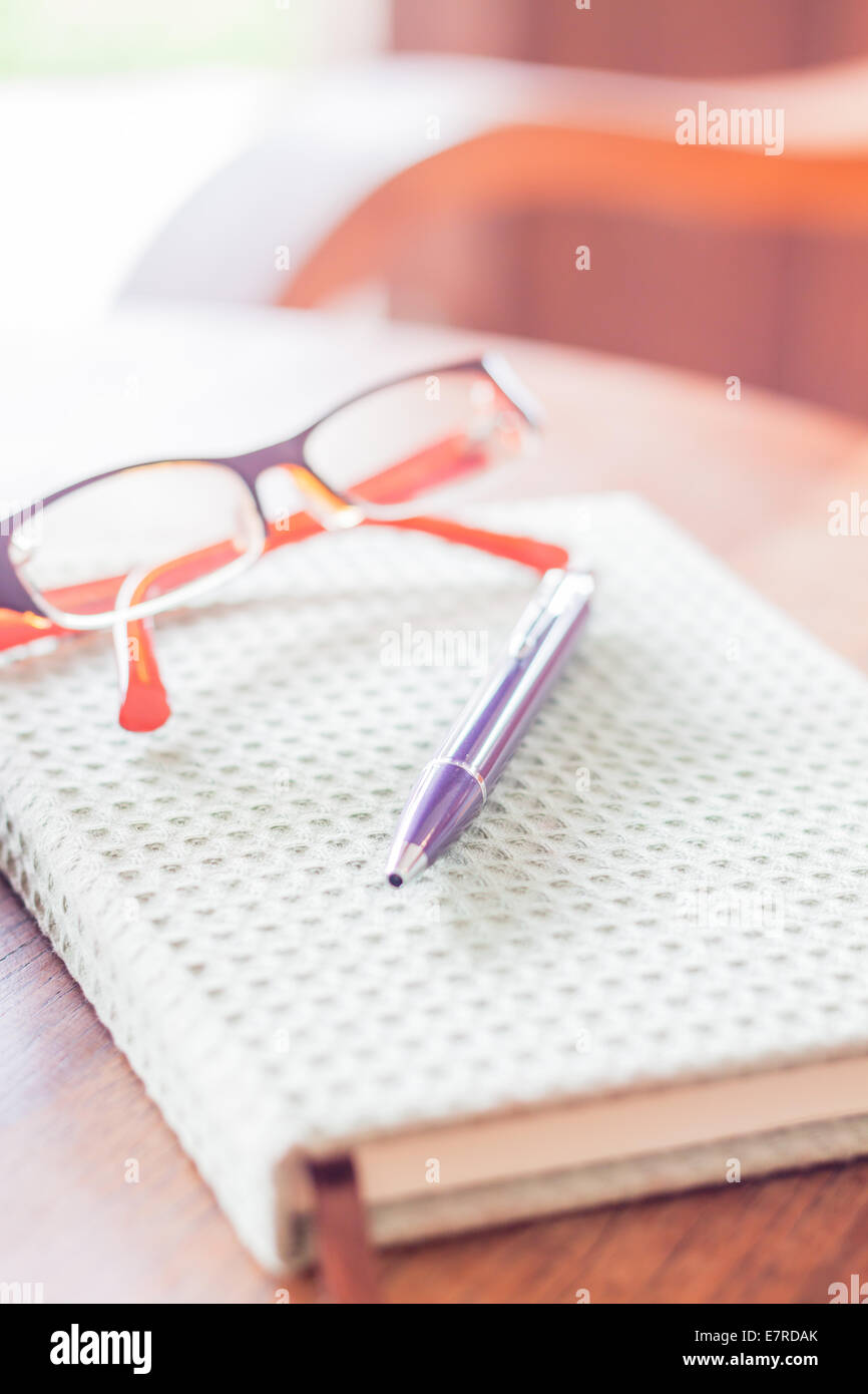 Eyeglasses and pen hi-res stock photography and images - Alamy